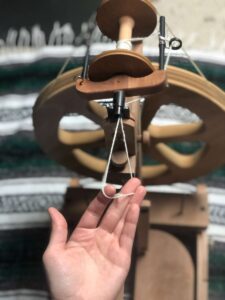 How to Use a Spinning Wheel (5 Simple Steps to Make Yarn) - Yarn Hustler